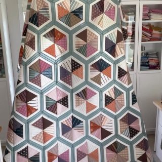 Triangle Hexies quilts Archives - Quilty Love