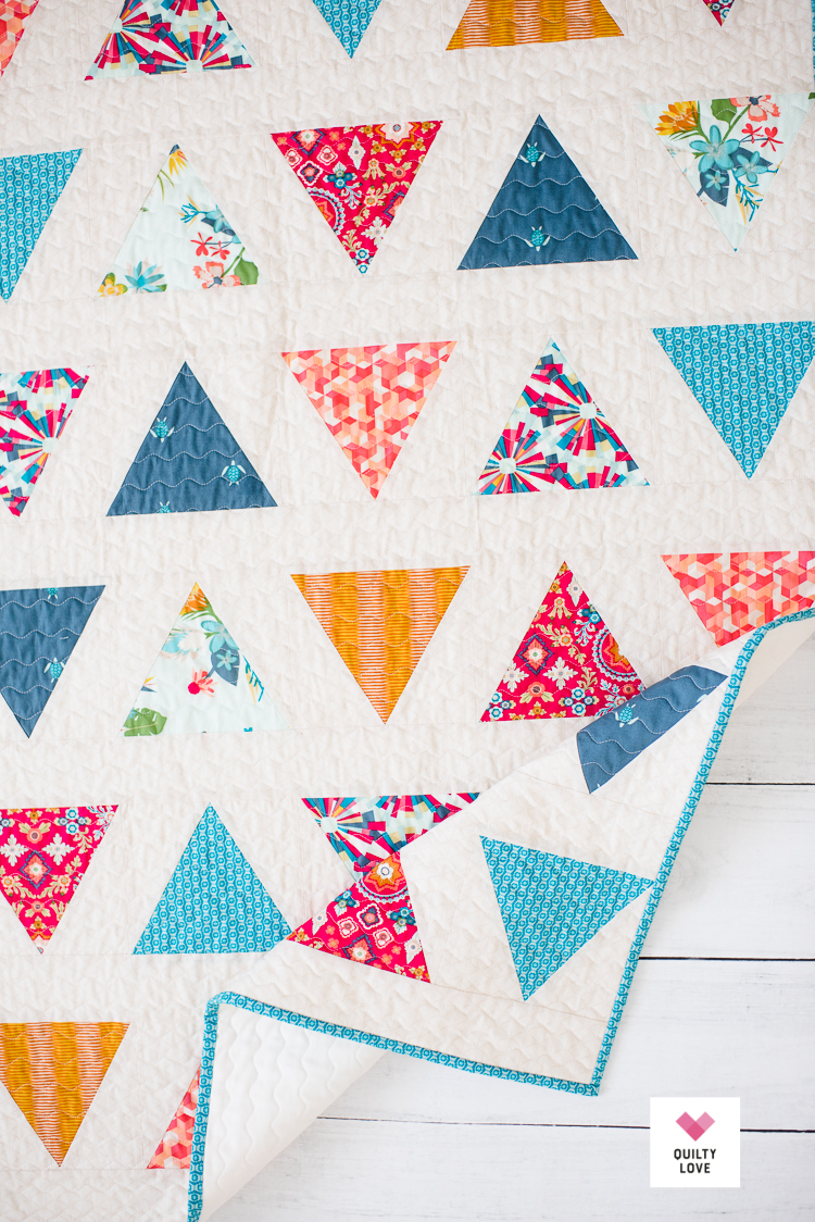 Triangle Pop baby quilt- The Aura fabrics one - Quilty Love