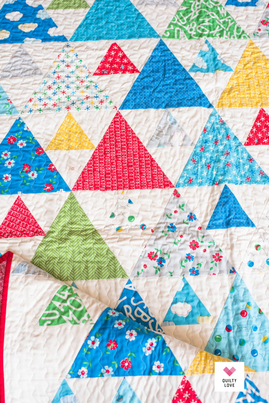 Bounce Triangle Peaks quilt - Quilty Love