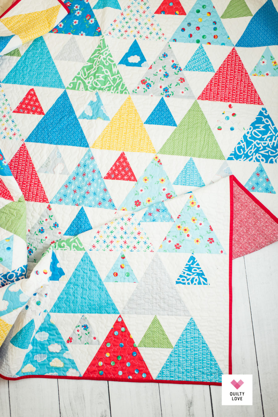 Bounce Triangle Peaks quilt - Quilty Love