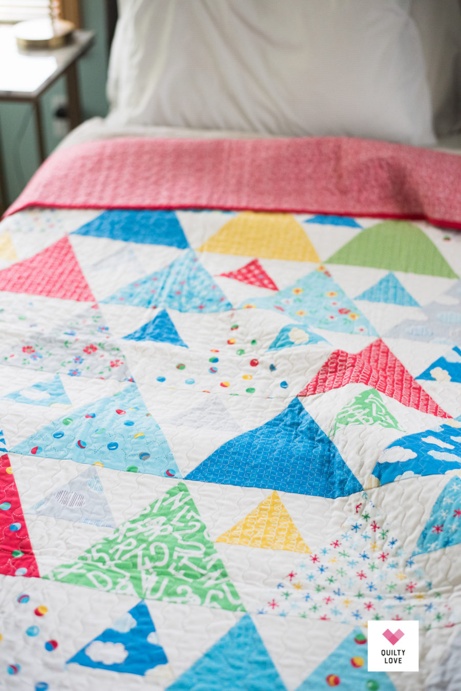 Bounce Triangle Peaks quilt - Quilty Love
