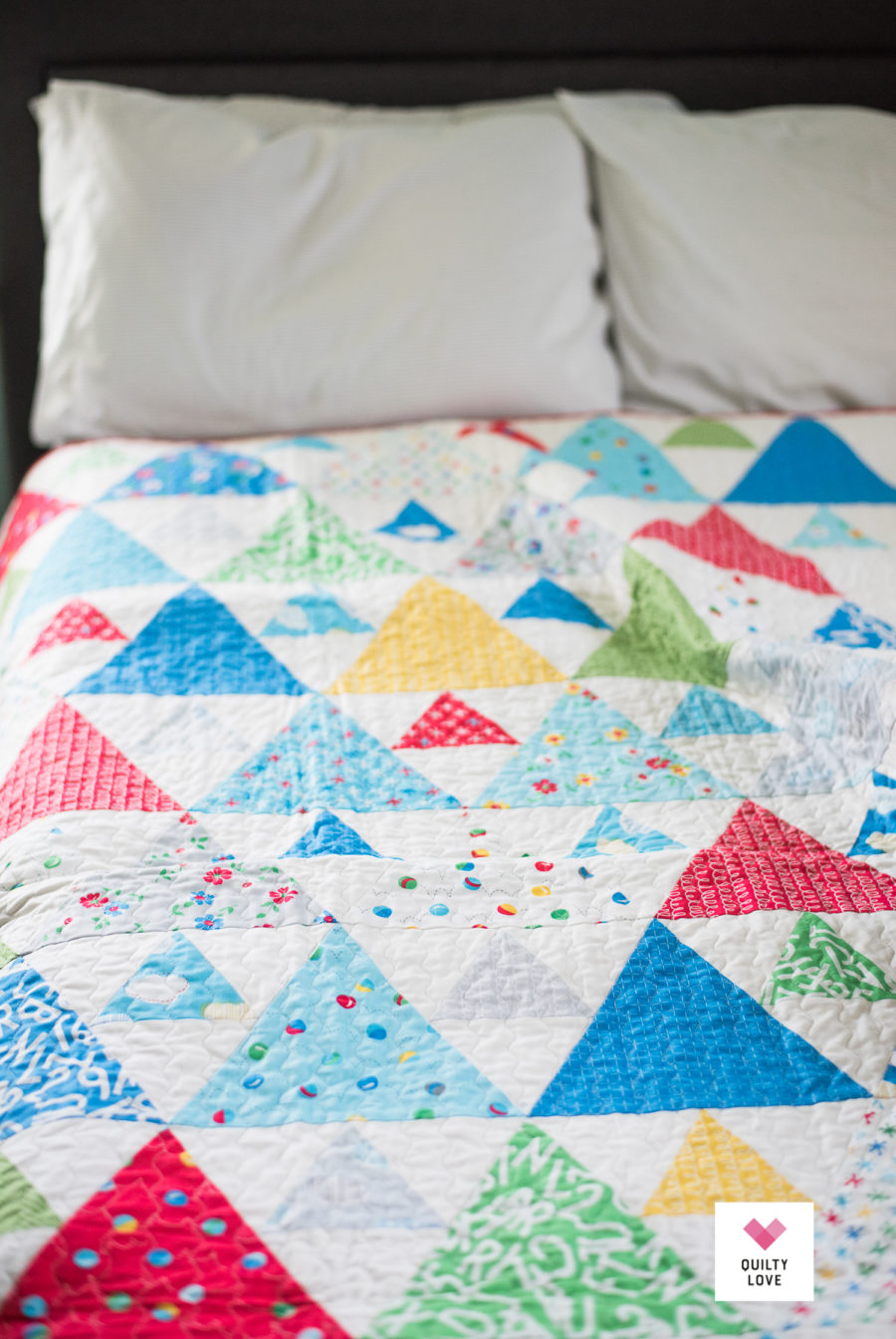 Bounce Triangle Peaks quilt - Quilty Love