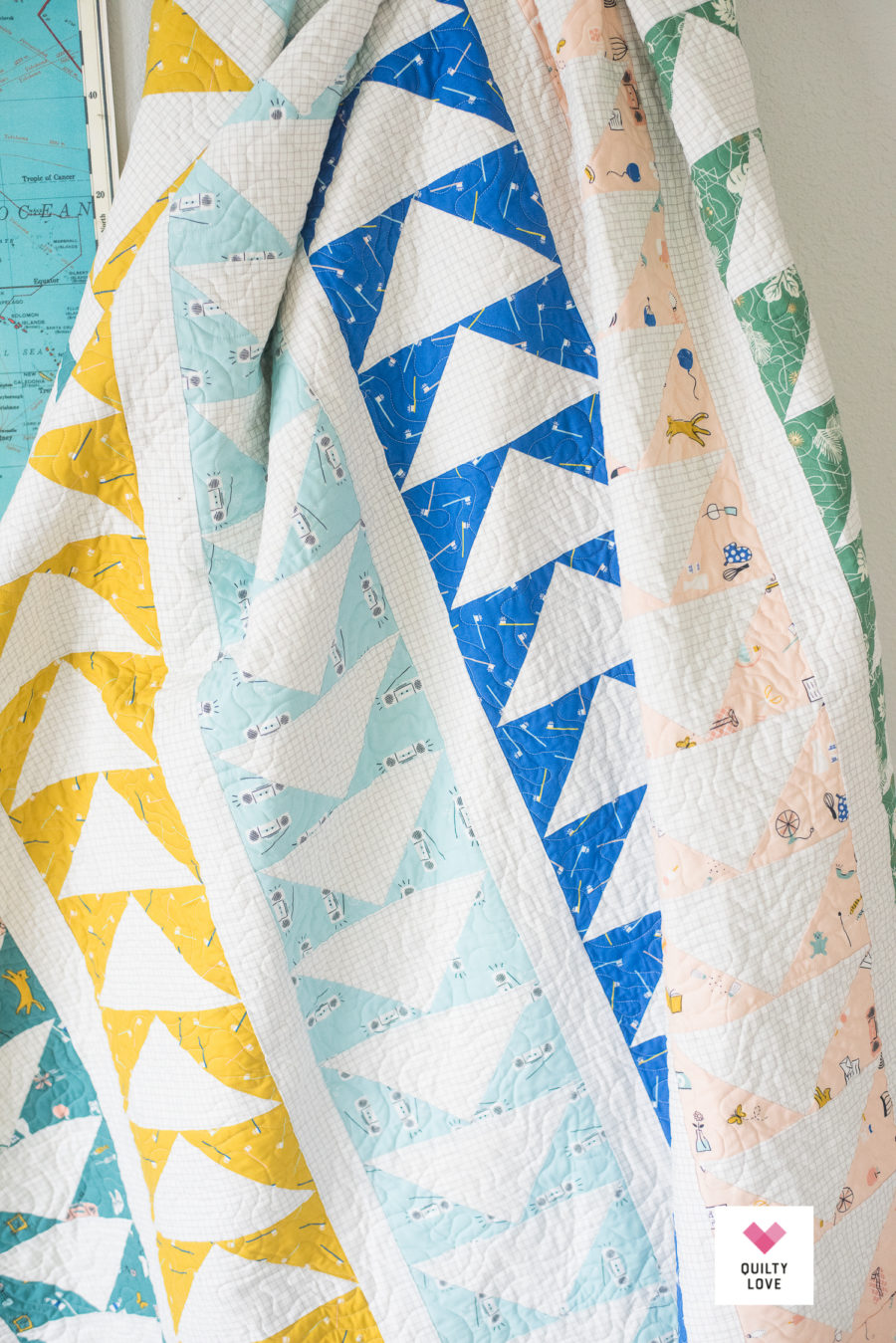 Flying quilt - A flying geese quilt pattern - Quilty Love