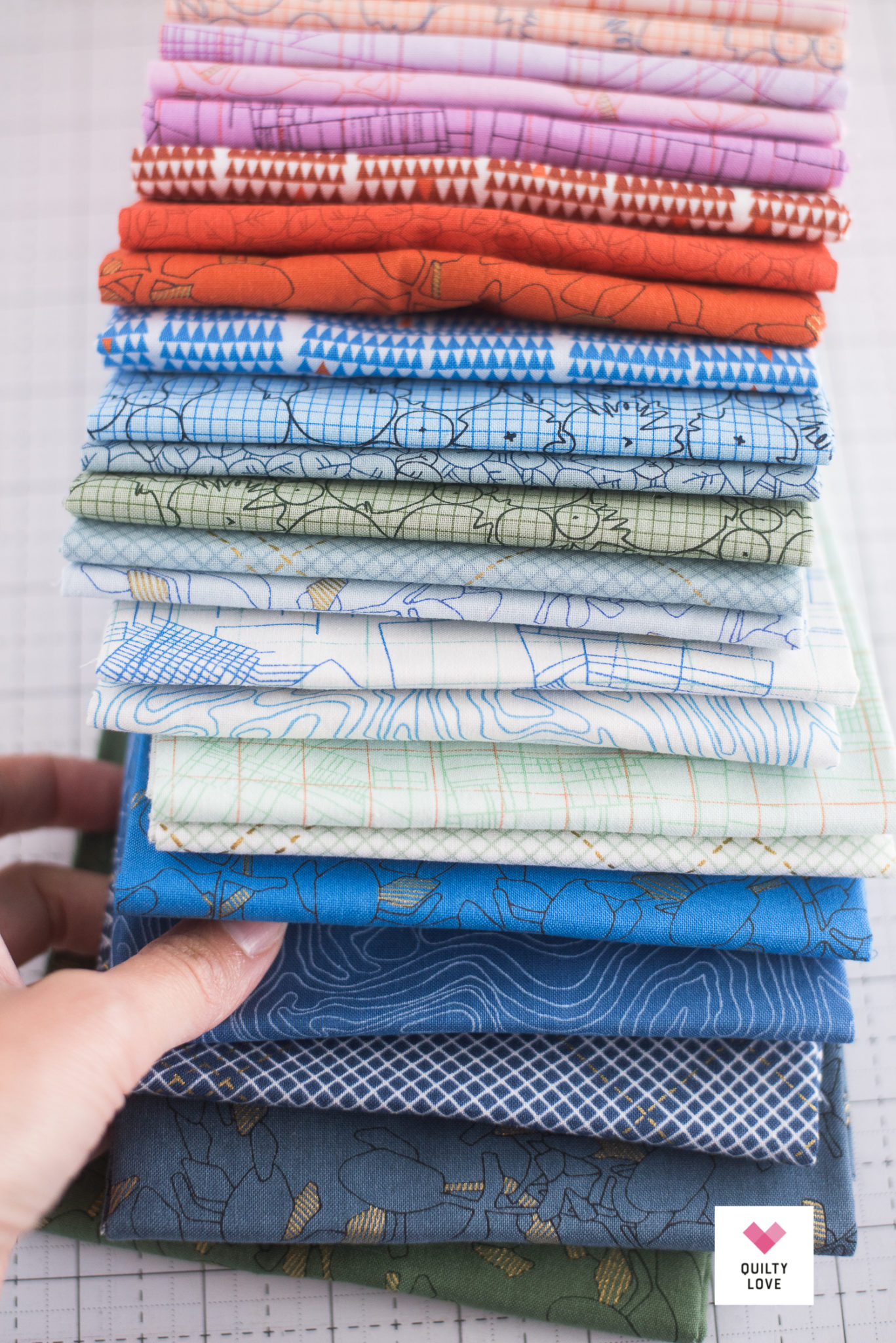 The Carolyn Friedlander Triangle Pop quilt - Quilty Love