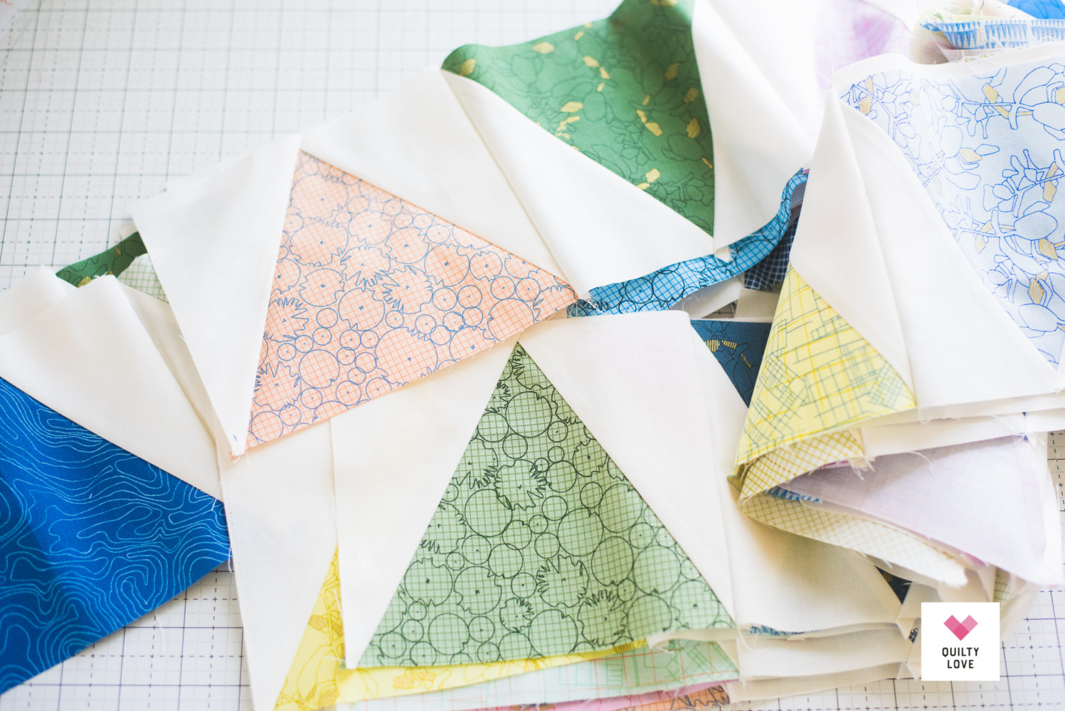The Carolyn Friedlander Triangle Pop quilt - Quilty Love
