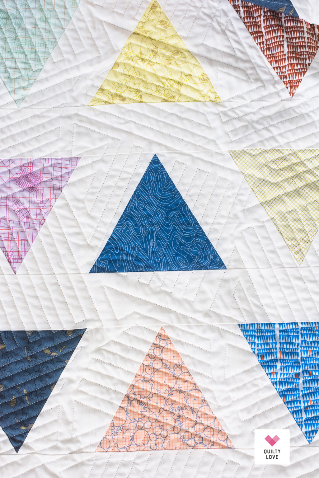 The Carolyn Friedlander Triangle Pop quilt - Quilty Love