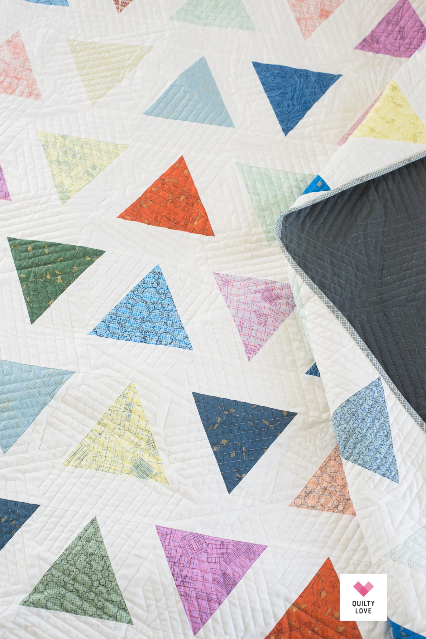 The Carolyn Friedlander Triangle Pop quilt - Quilty Love