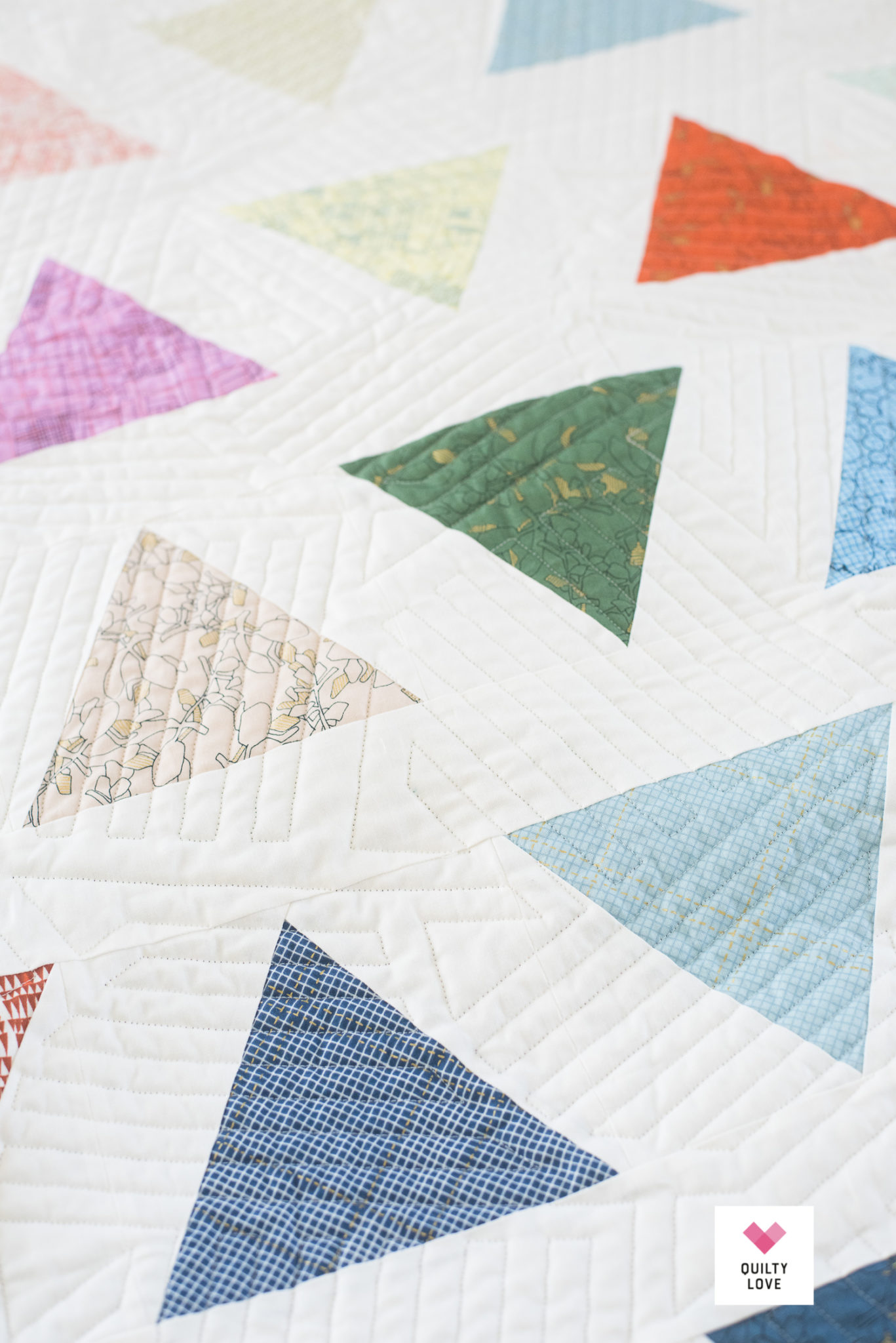 The Carolyn Friedlander Triangle Pop quilt - Quilty Love