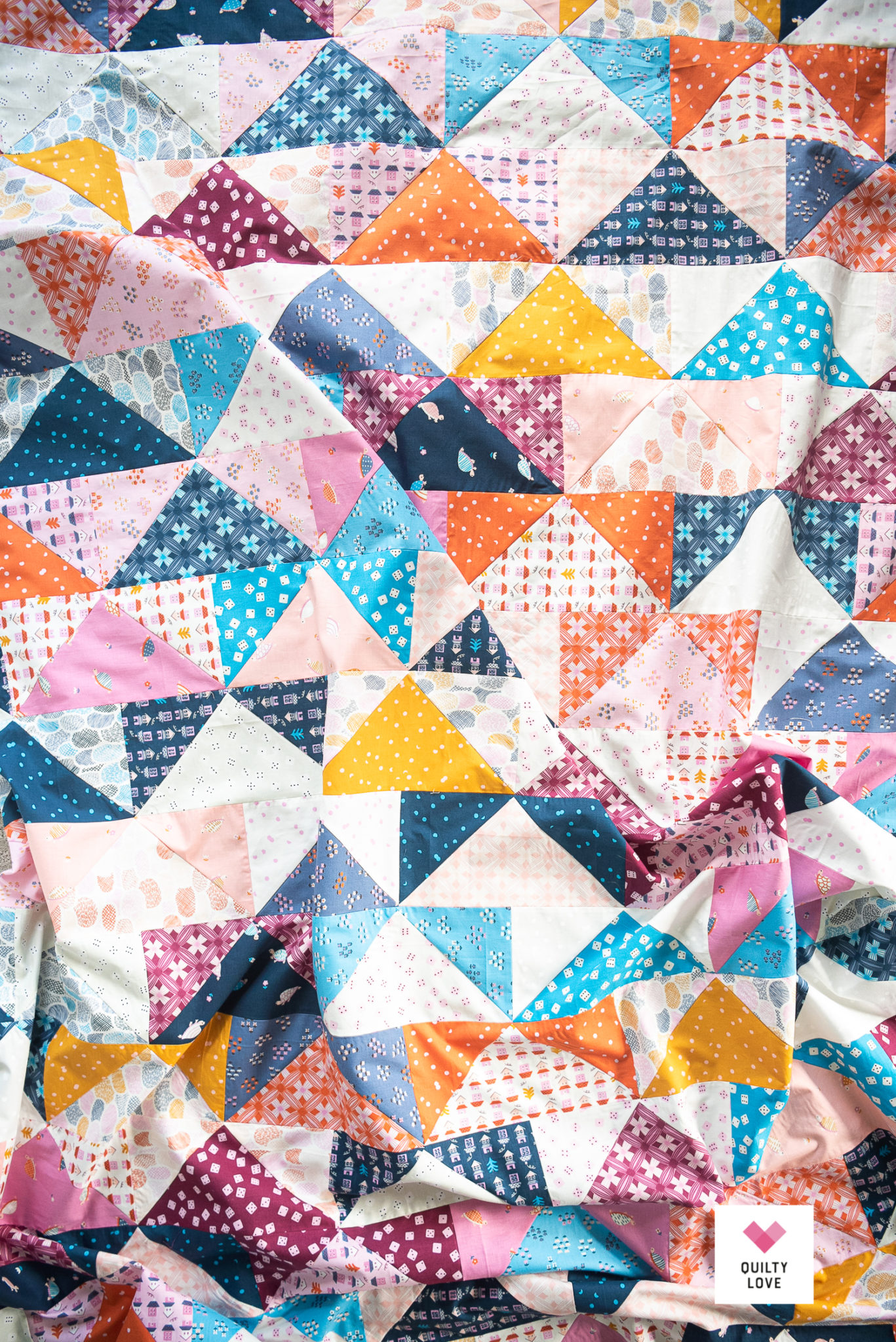 Patchwork Flying Geese Quilt - A Stash Buster quilt pattern - Quilty Love