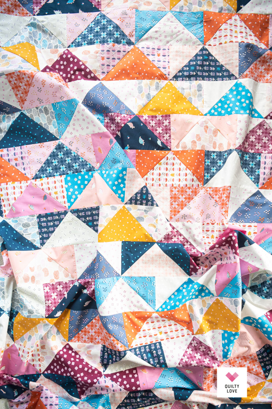 Patchwork Flying Geese Quilt - A Stash Buster quilt pattern - Quilty Love