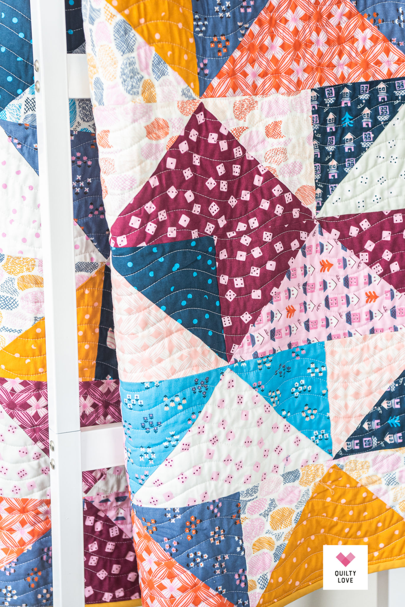 Patchwork Flying Geese Quilt - A Stash Buster quilt pattern - Quilty Love