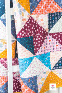Patchwork Flying Geese Quilt - A Stash Buster quilt pattern - Quilty Love
