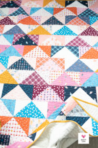 Patchwork Flying Geese Quilt - A Stash Buster quilt pattern - Quilty Love