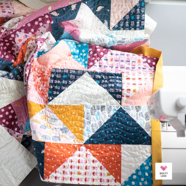 Patchwork Flying Geese Quilt - A Stash Buster quilt pattern - Quilty Love