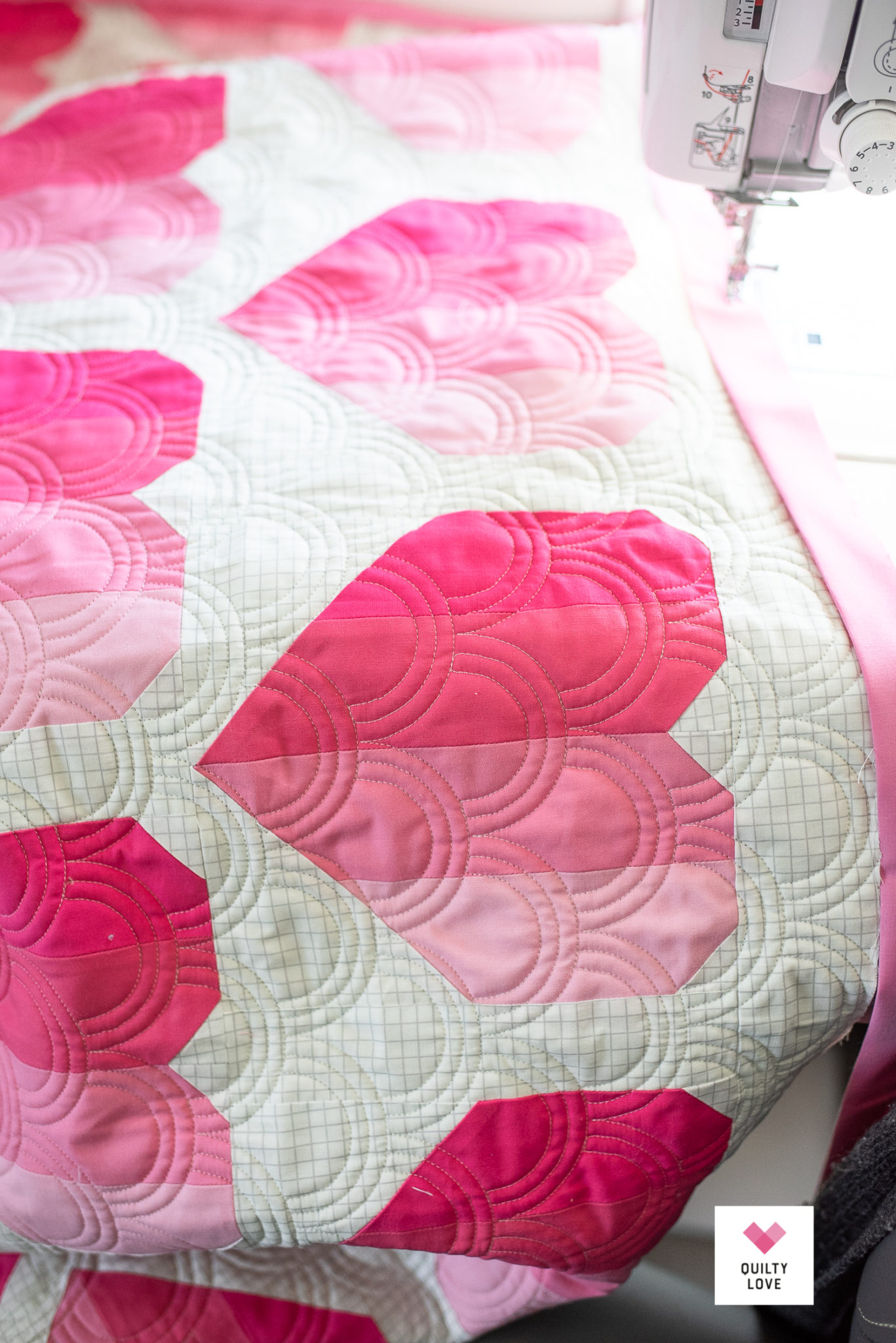 Four Color Infinite Hearts quilt - Quilty Love