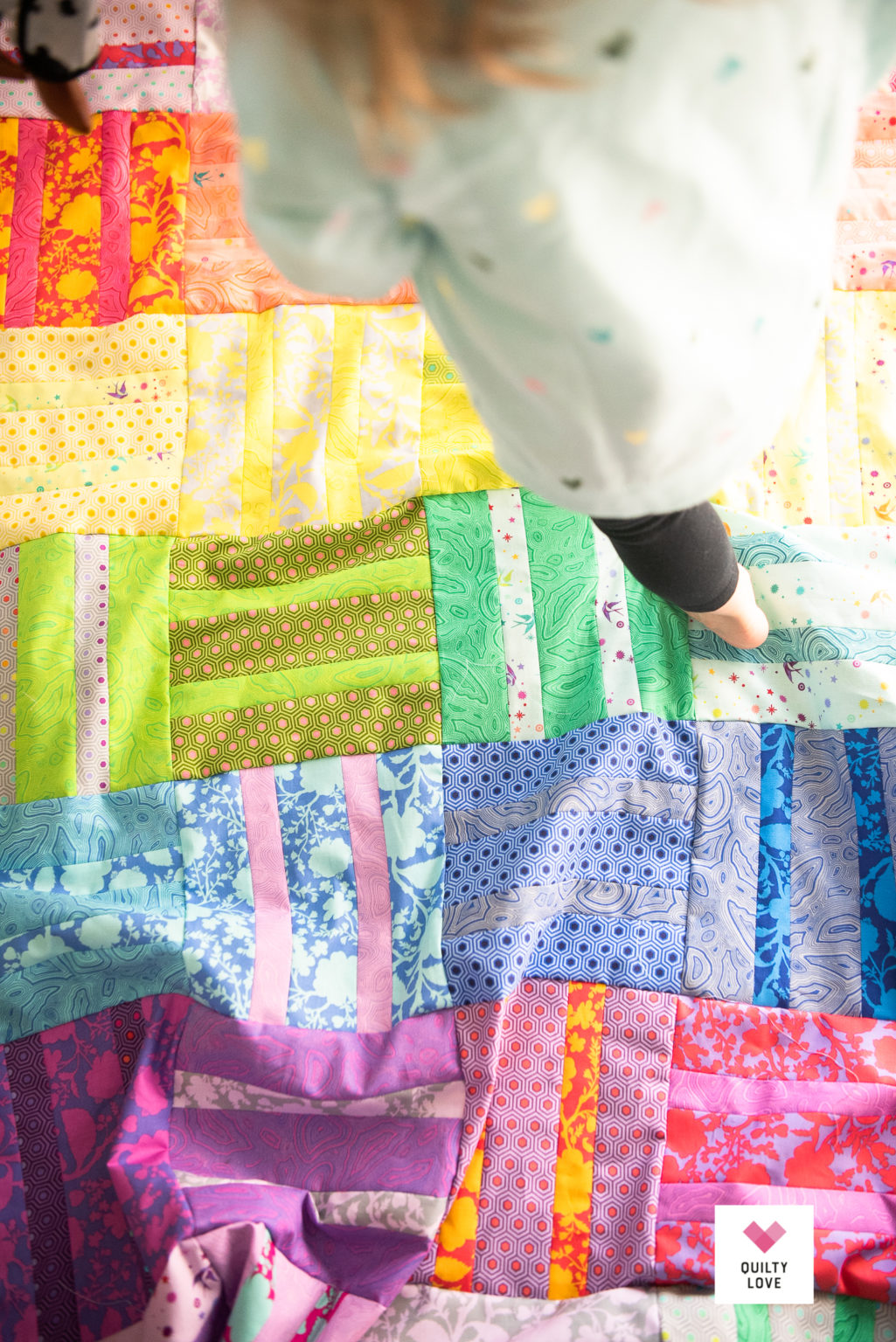 Cake Dash Quilt Pattern - A layer cake quilt pattern - Quilty Love