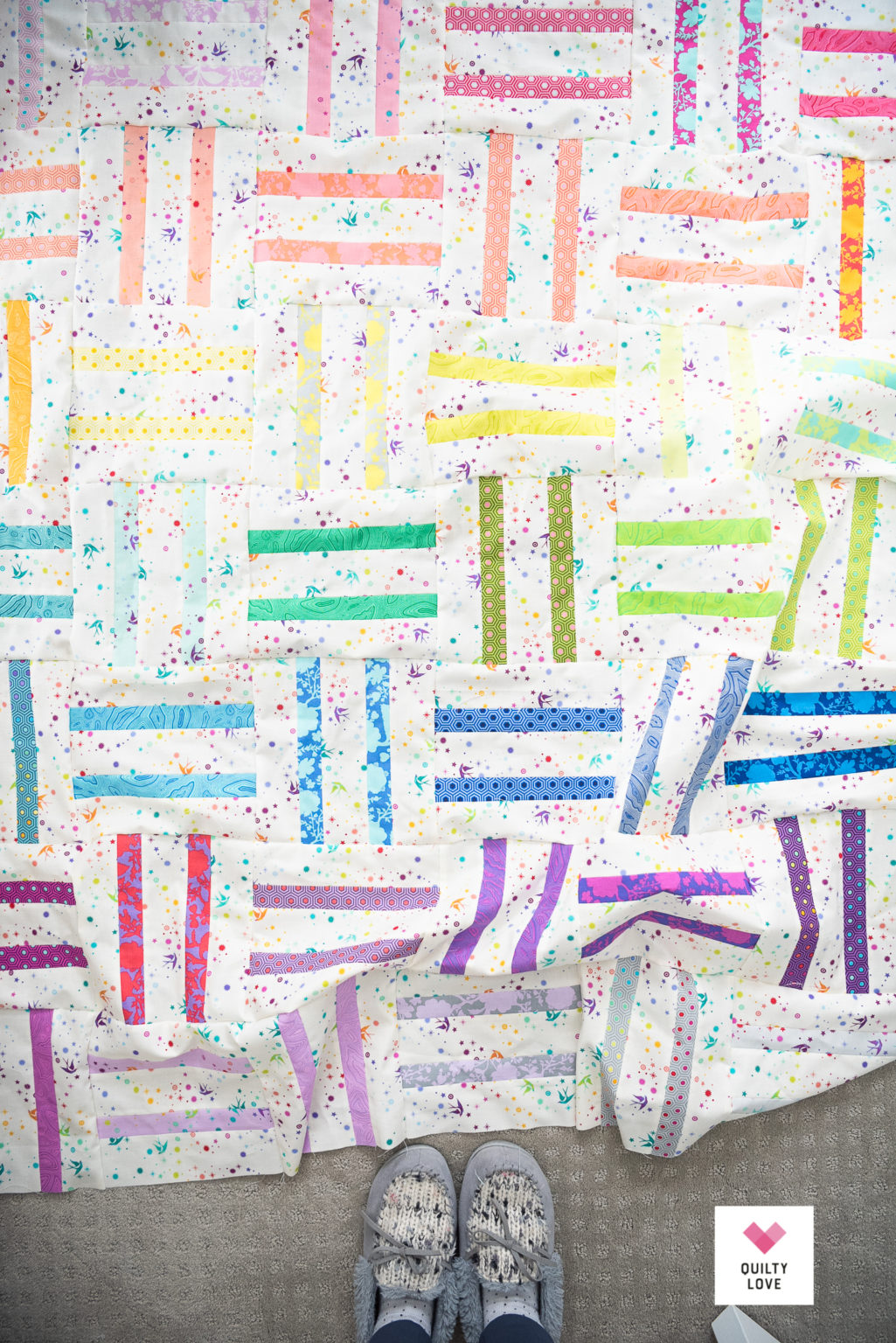 Cake Dash Quilt Pattern - A layer cake quilt pattern - Quilty Love