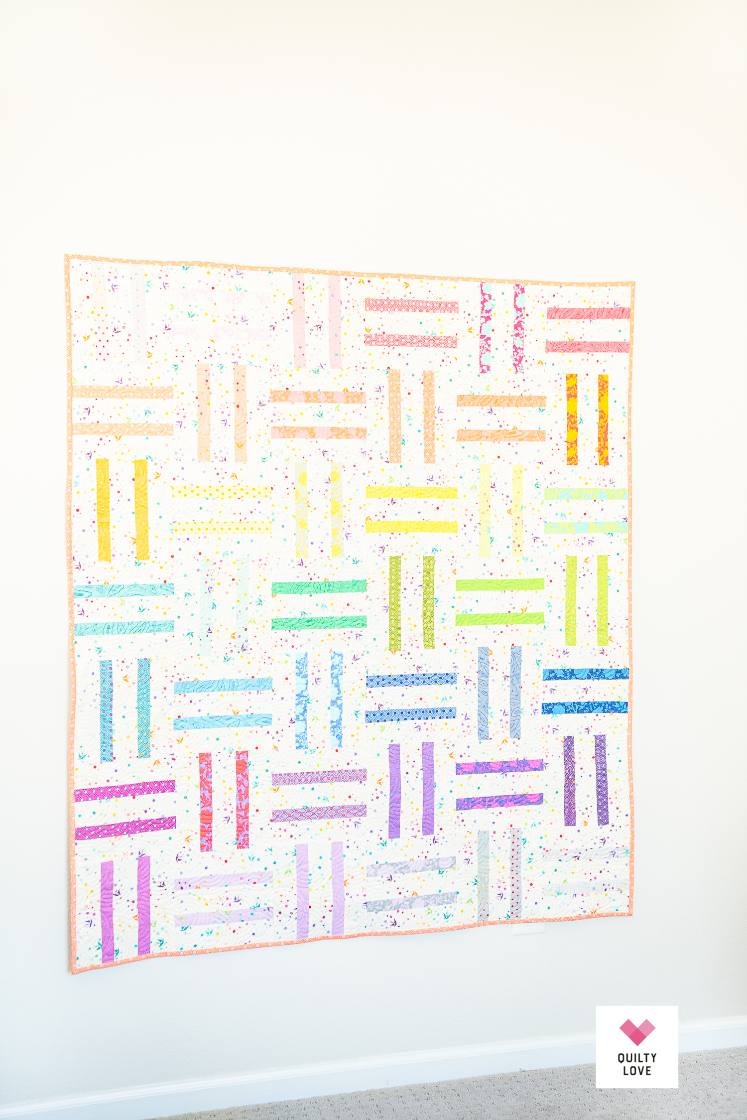 Cake Dash Quilt Pattern - A layer cake quilt pattern - Quilty Love