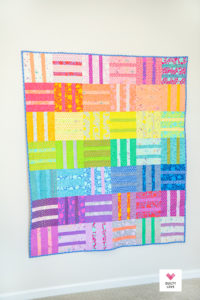 Cake Dash Quilt Pattern - A layer cake quilt pattern - Quilty Love