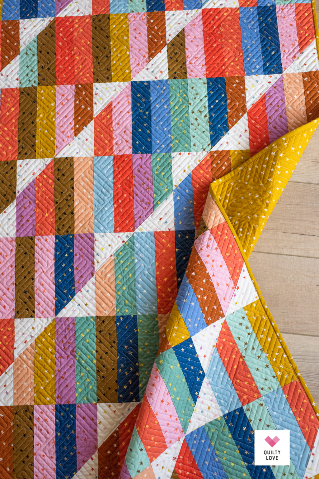 Happy Stripes quilt pattern - Starry Fabrics Stash Buster - Quilty Love