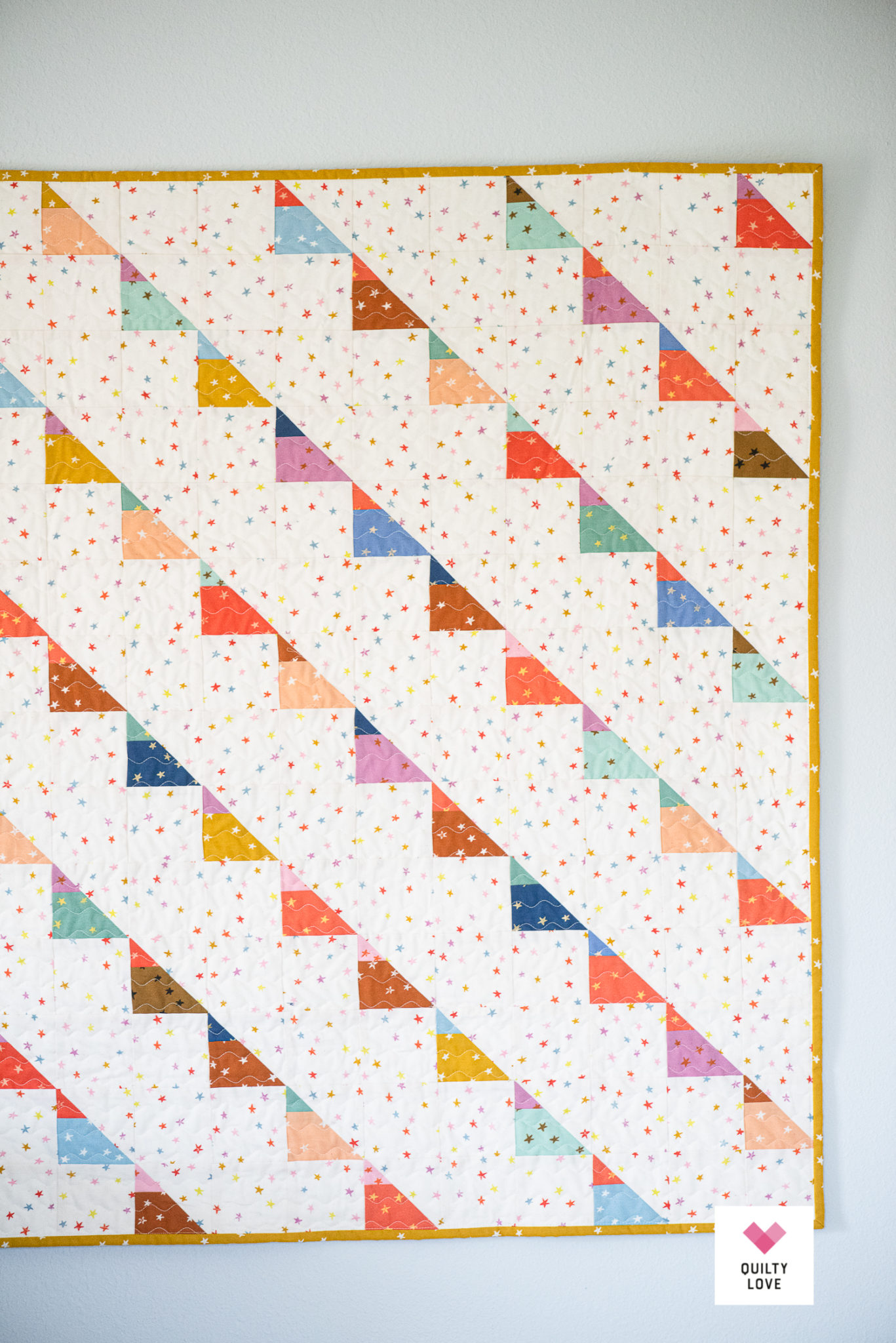 Happy Stripes quilt pattern - Starry Fabrics Stash Buster - Quilty Love