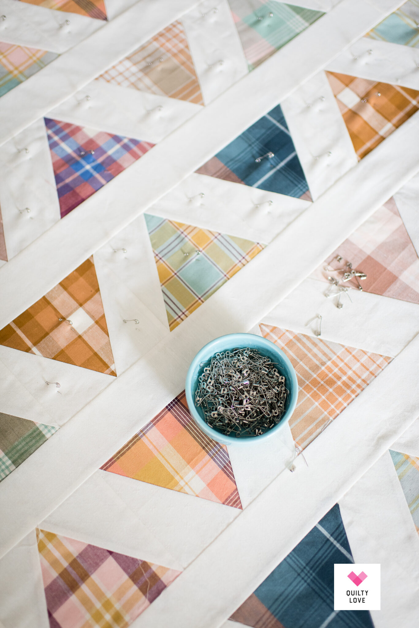 Fableism Arcade Plaid Triangle Pop baby quilt - Quilty Love