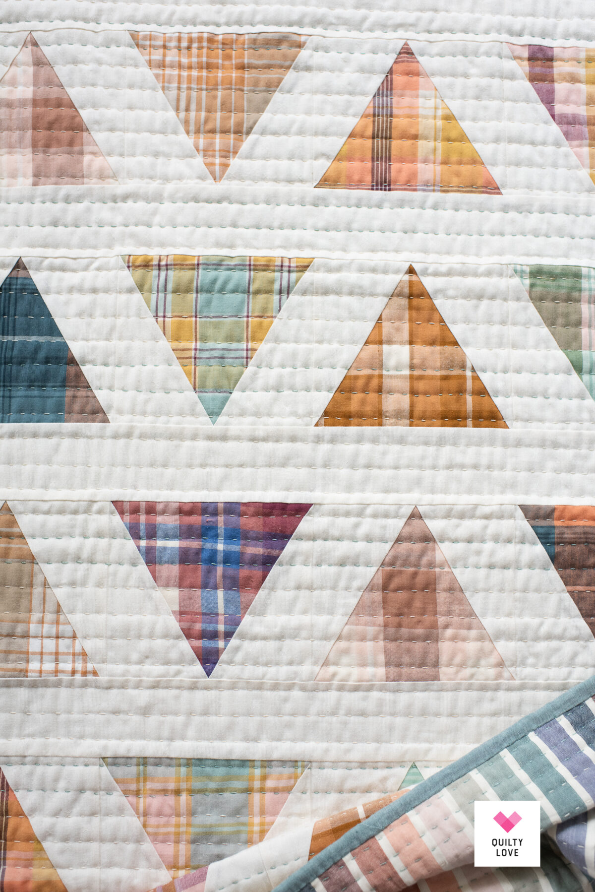 Fableism Arcade Plaid Triangle Pop baby quilt - Quilty Love
