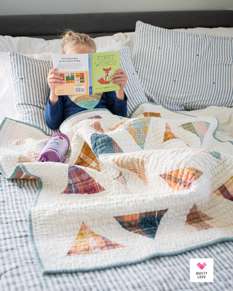 Fableism Arcade Plaid Triangle Pop baby quilt - Quilty Love