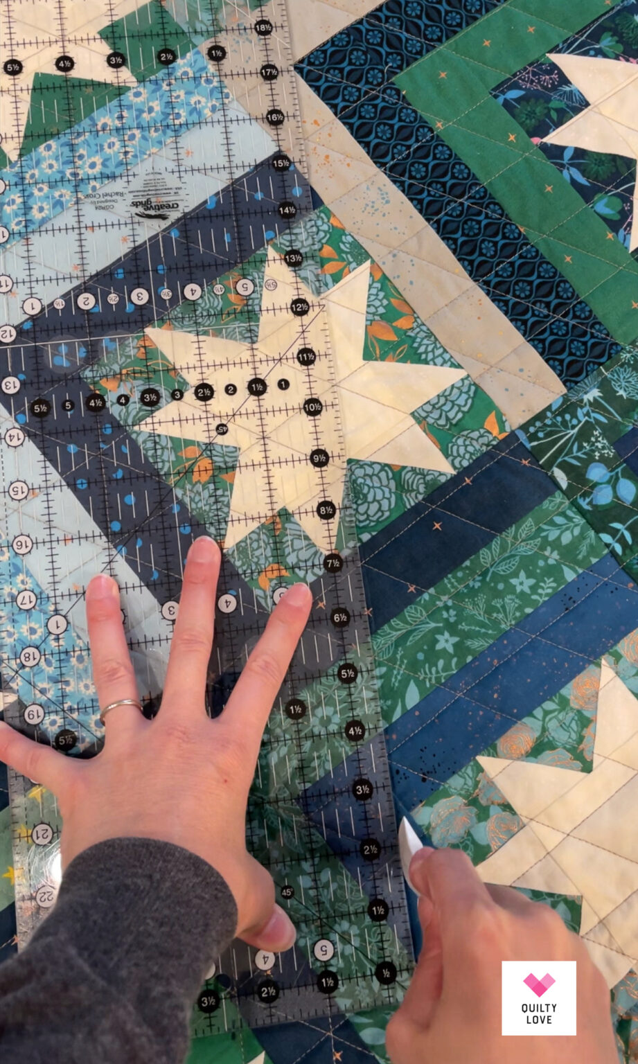 Scrappy Log Cabin Stars quilt - Quilty Love