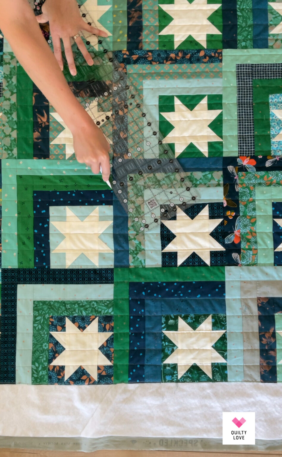 Scrappy Log Cabin Stars quilt - Quilty Love