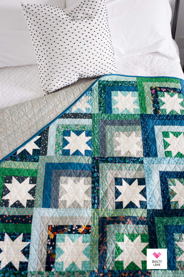 Scrappy Log Cabin Stars quilt - Quilty Love