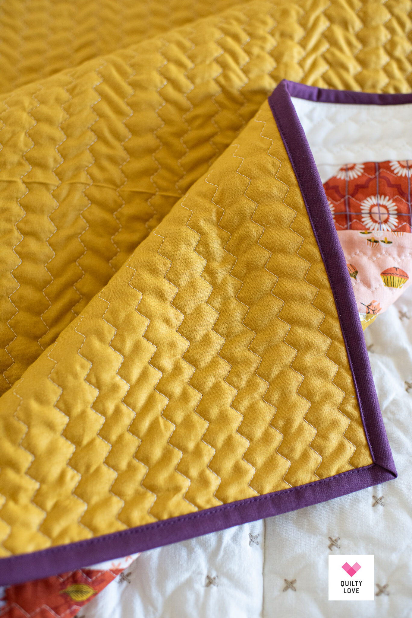 Jelly Roll Happy Scallops quilt - Quilty Love