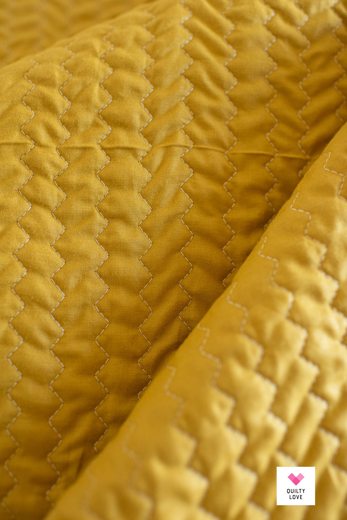 Jelly Roll Happy Scallops quilt - Quilty Love