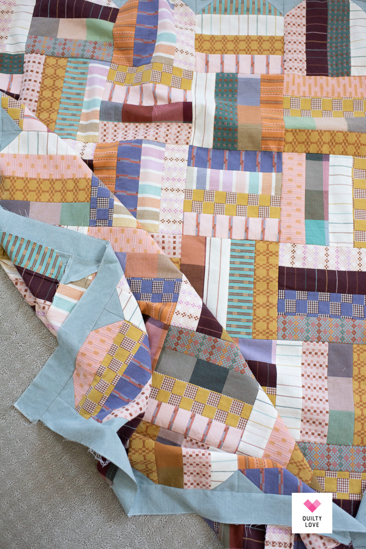 Happy Scallops quilt pattern - Quilty Love