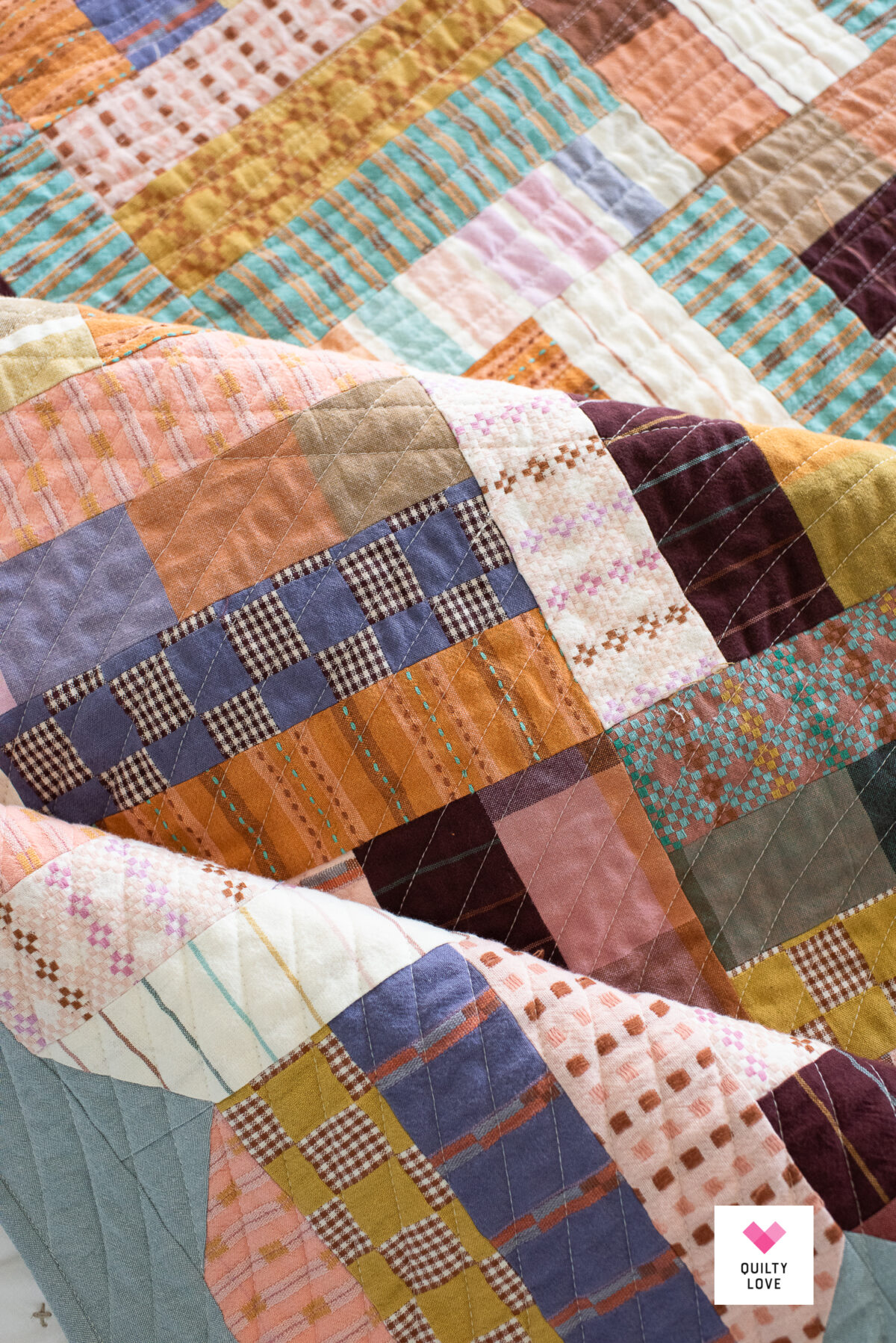 Happy Scallops quilt pattern - Quilty Love