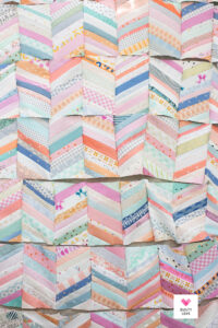 Pastel Scrappy String quilt - Quilty Love