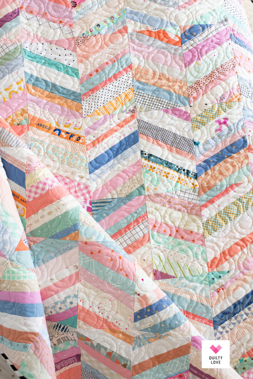 Pastel Scrappy String quilt - Quilty Love