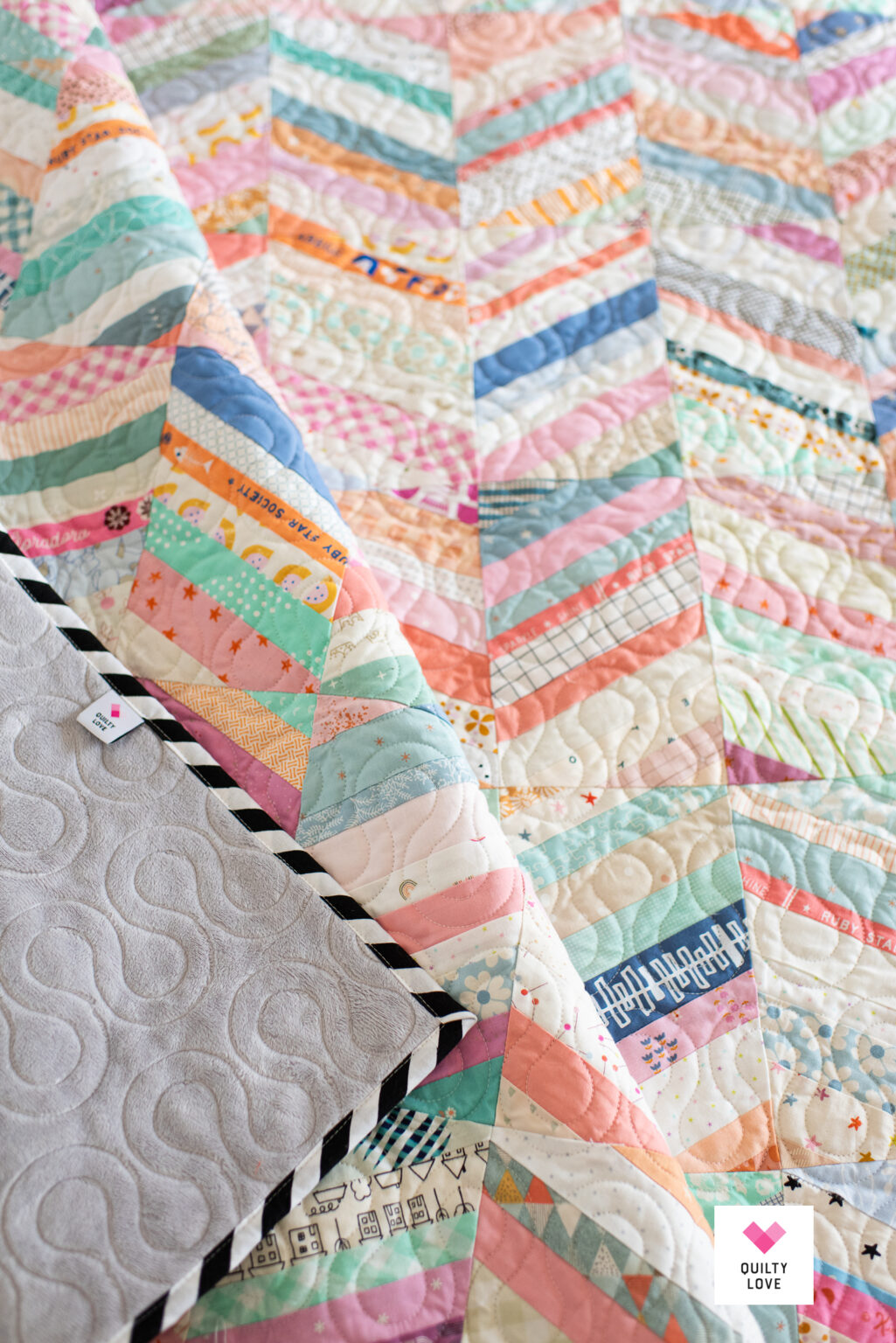 Pastel Scrappy String quilt - Quilty Love