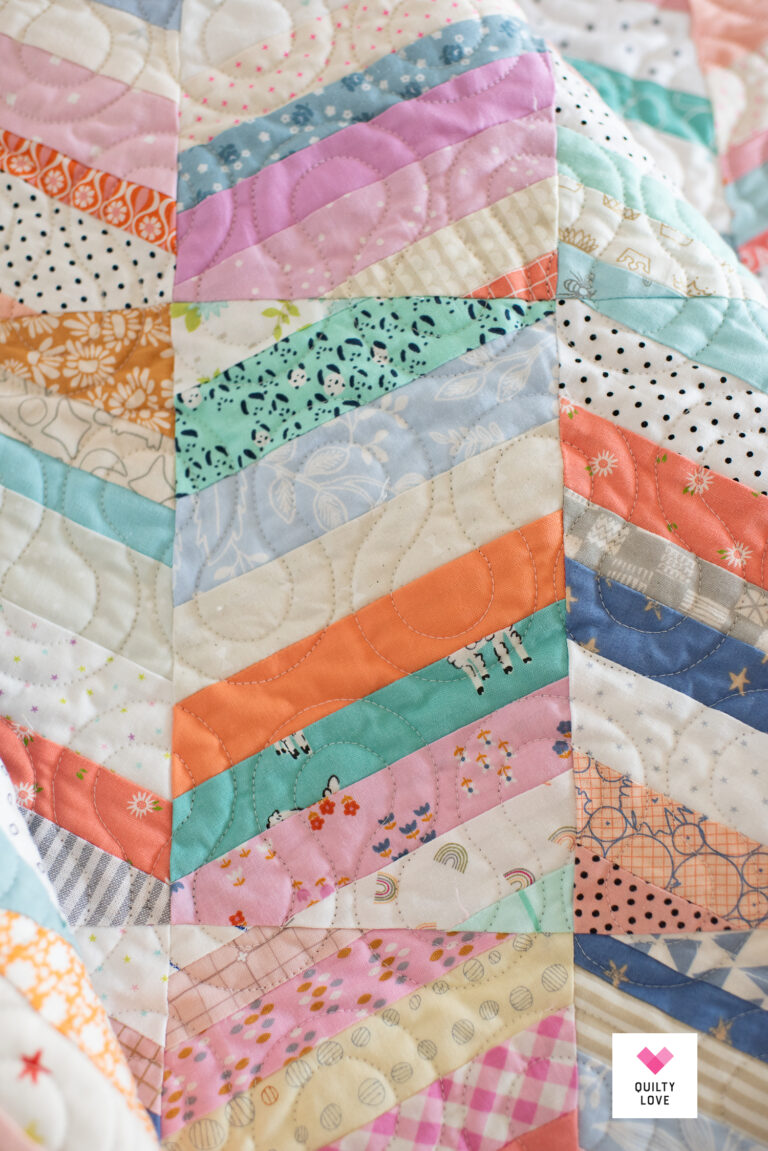 Pastel Scrappy String quilt - Quilty Love