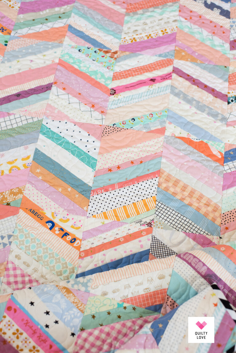 Pastel Scrappy String quilt - Quilty Love