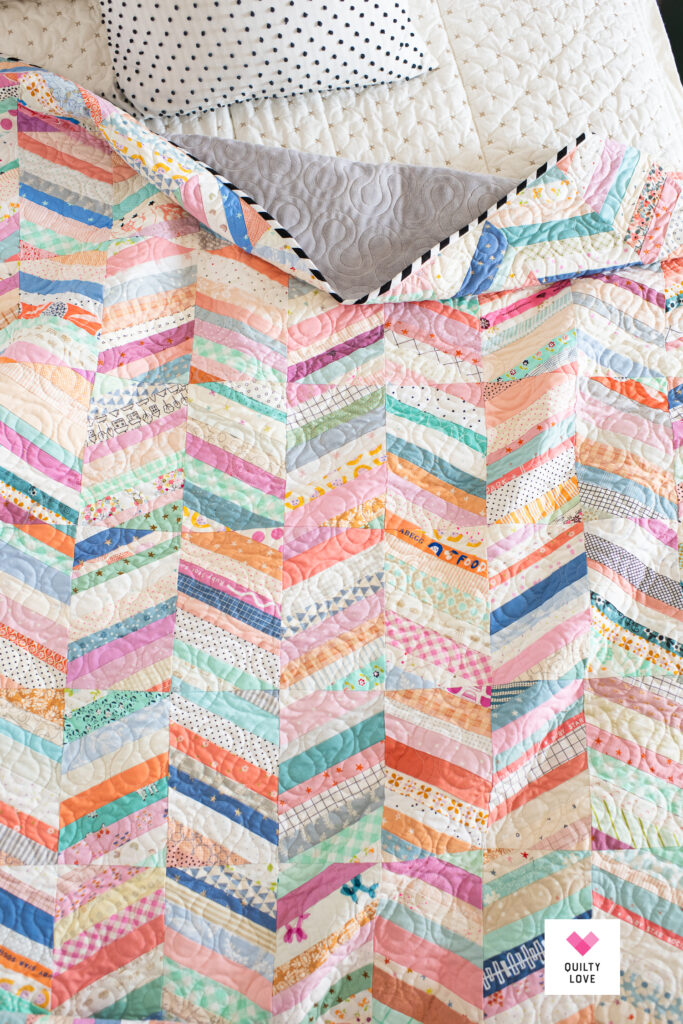 Pastel Scrappy String quilt - Quilty Love