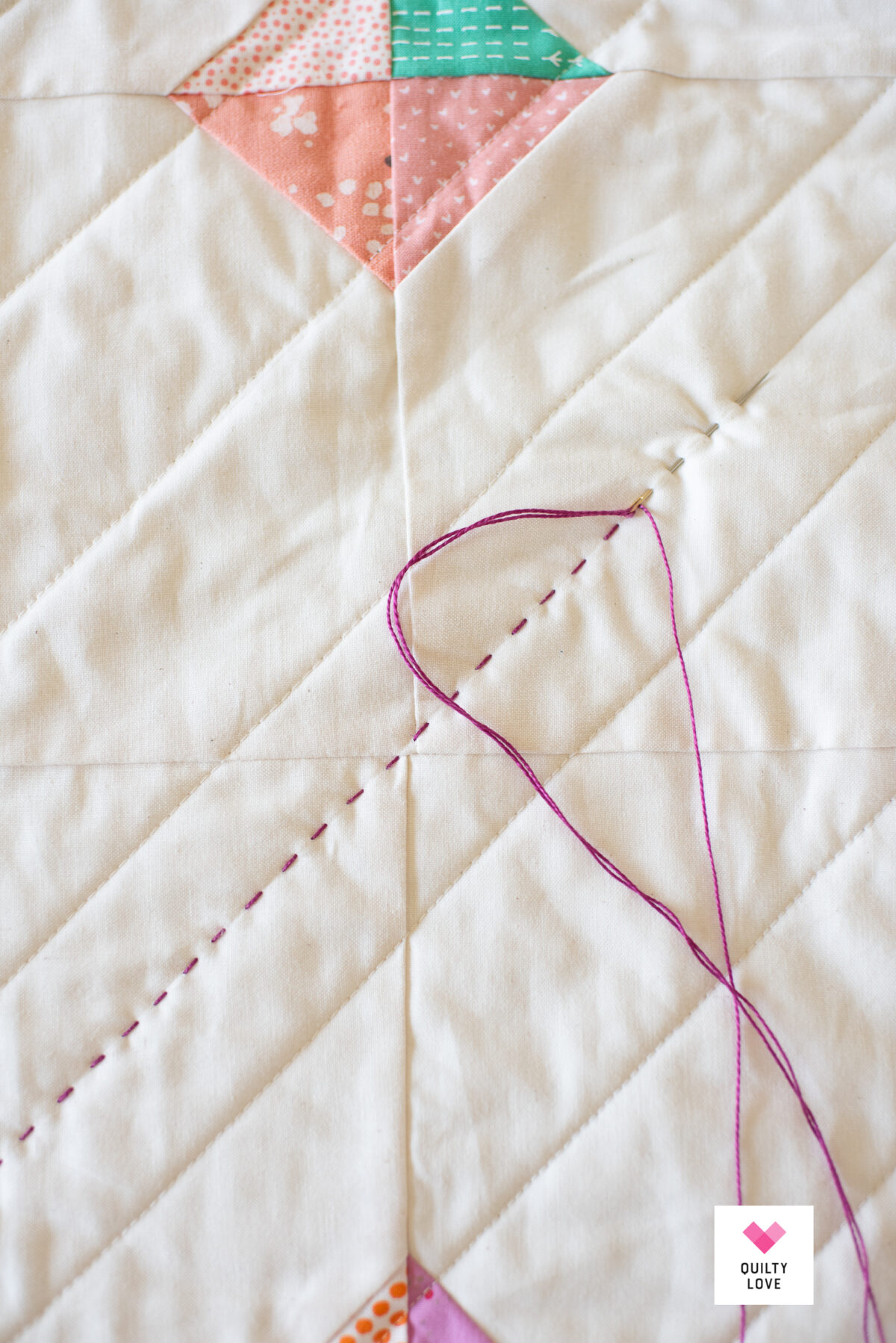 Free scrap stash quilt pattern - Scrappy Corners quilt - Quilty Love