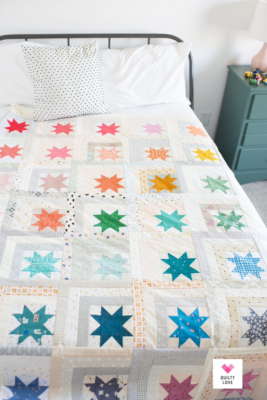 Rainbow Scrap Stash Log Cabin Stars quilt - Quilty Love