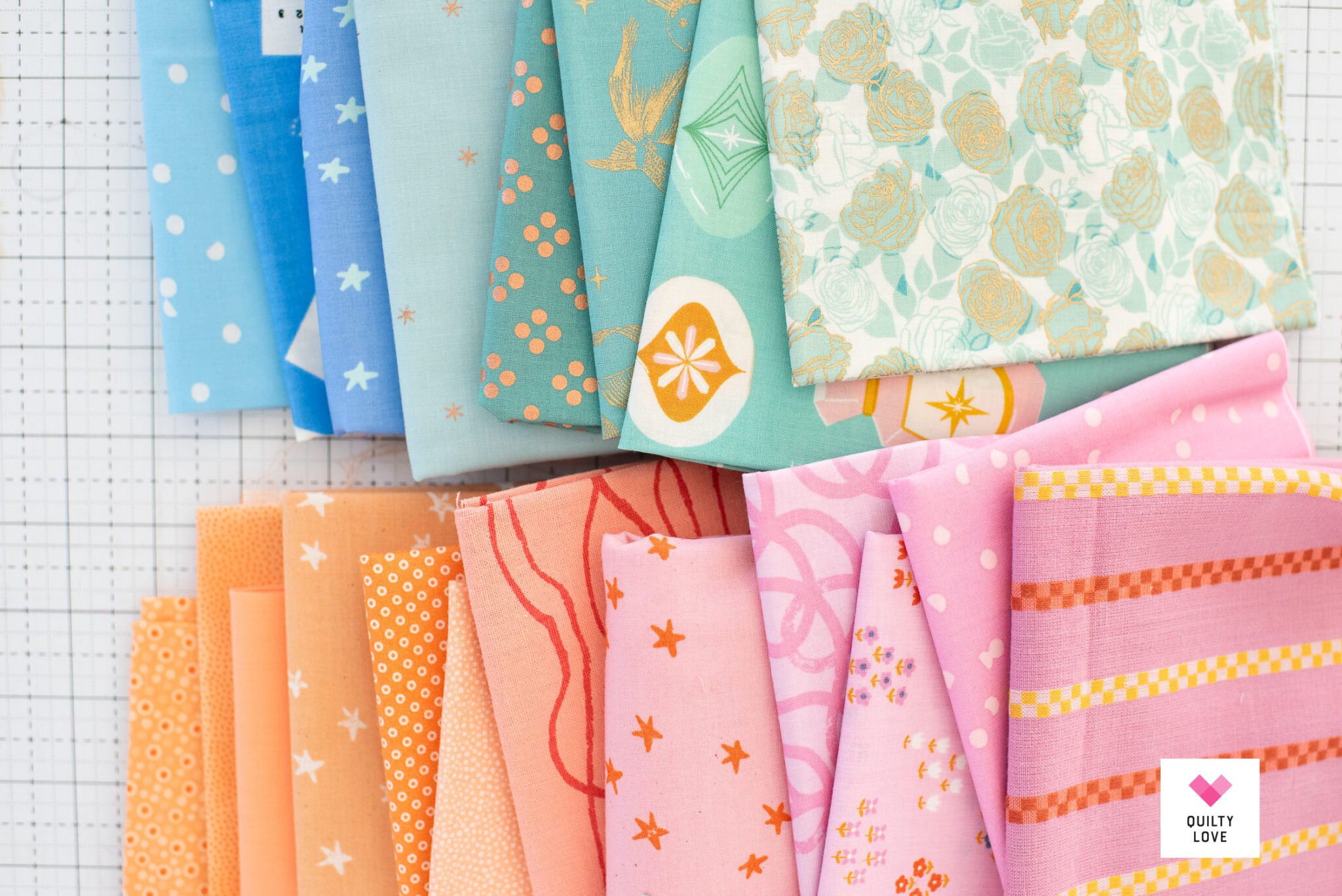 Scrappy Rainbow Patchwork Flying Geese quilt - Quilty Love