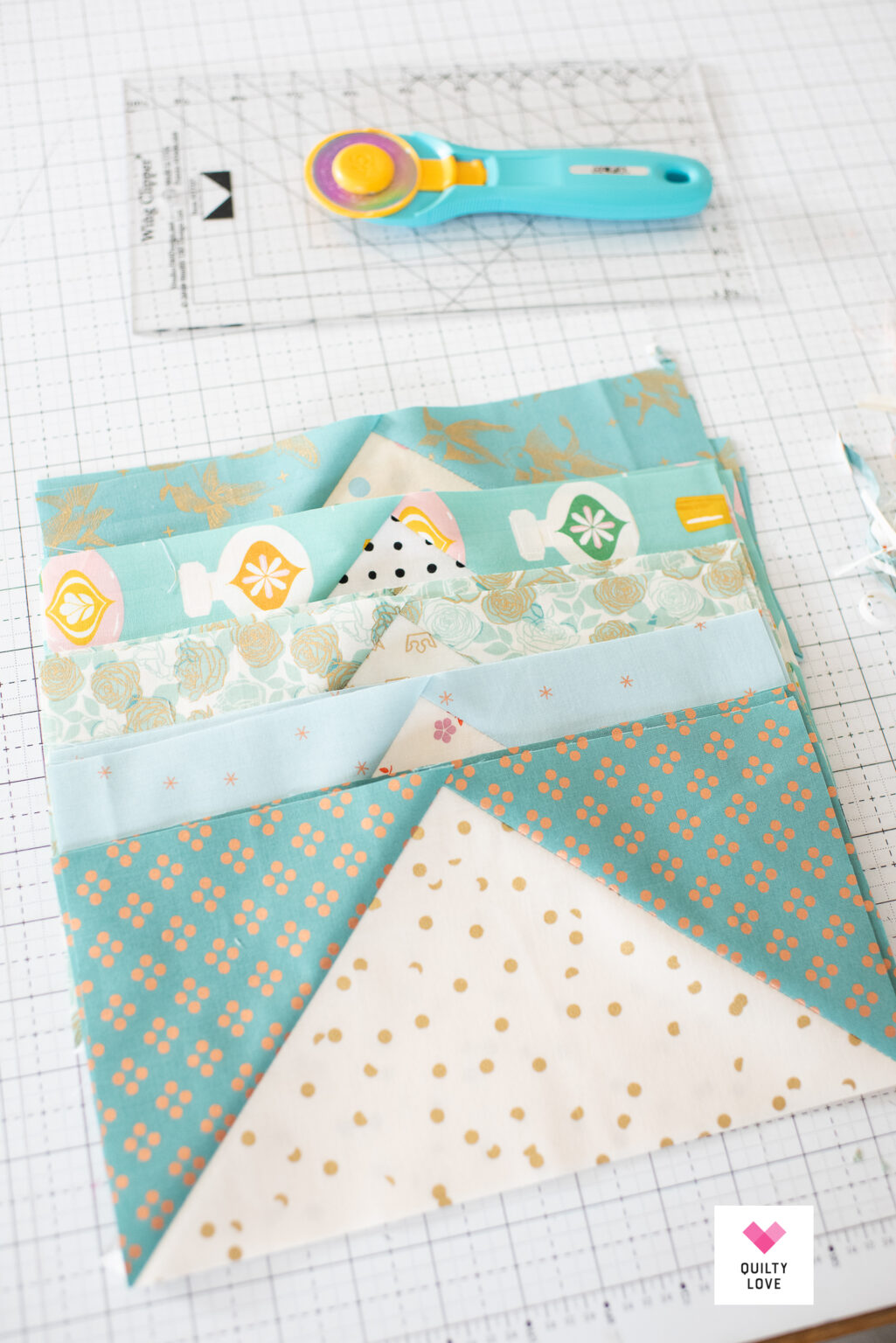 Scrappy Rainbow Patchwork Flying Geese quilt - Quilty Love