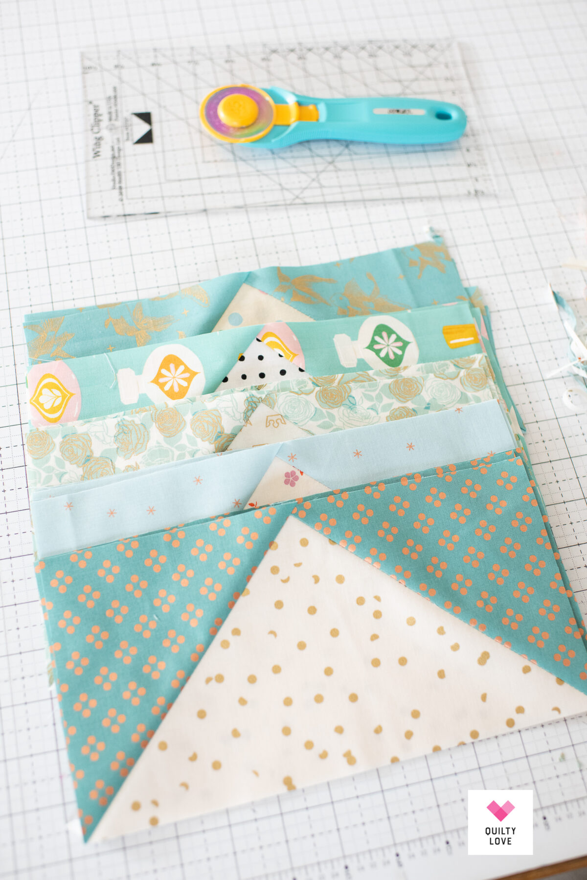 Scrappy Rainbow Patchwork Flying Geese quilt - Quilty Love