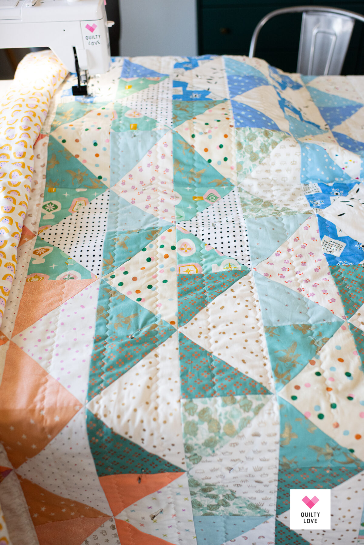Scrappy Rainbow Patchwork Flying Geese quilt - Quilty Love