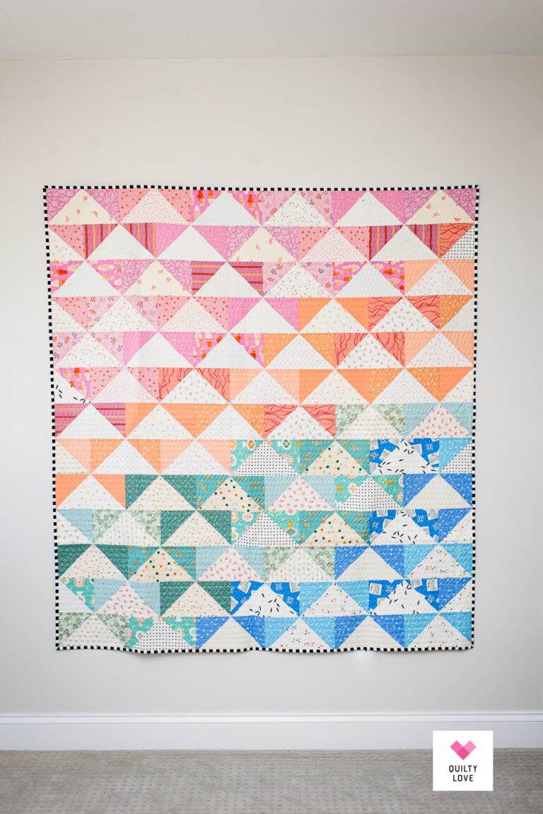 Scrappy Rainbow Patchwork Flying Geese quilt - Quilty Love