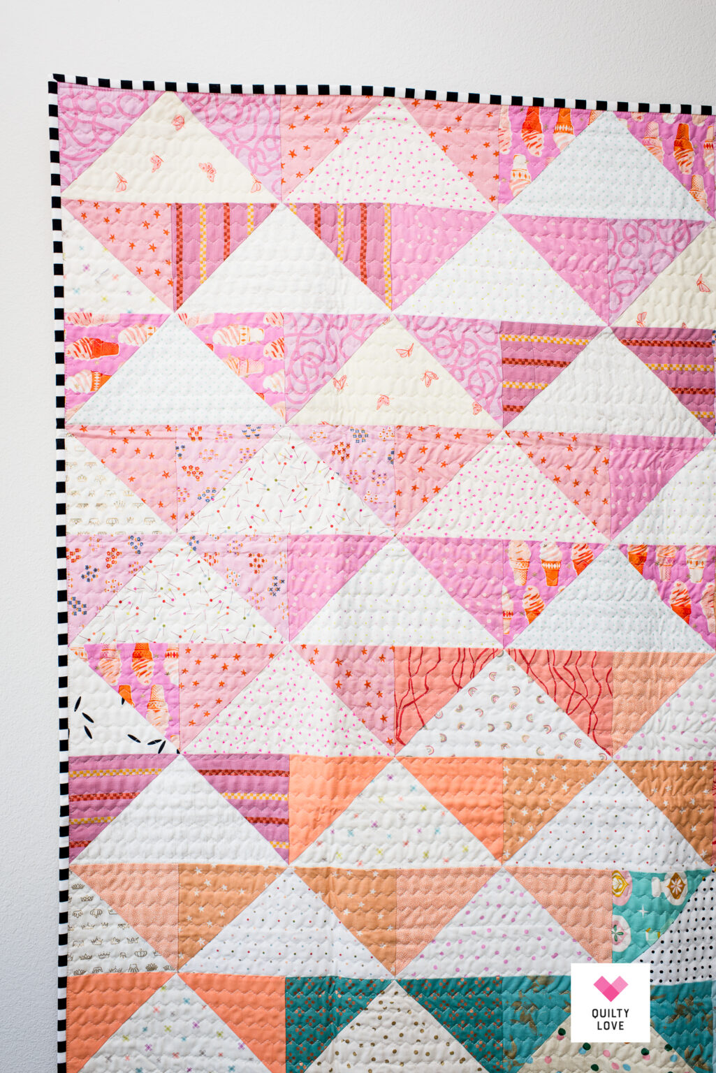 Scrappy Rainbow Patchwork Flying Geese quilt - Quilty Love