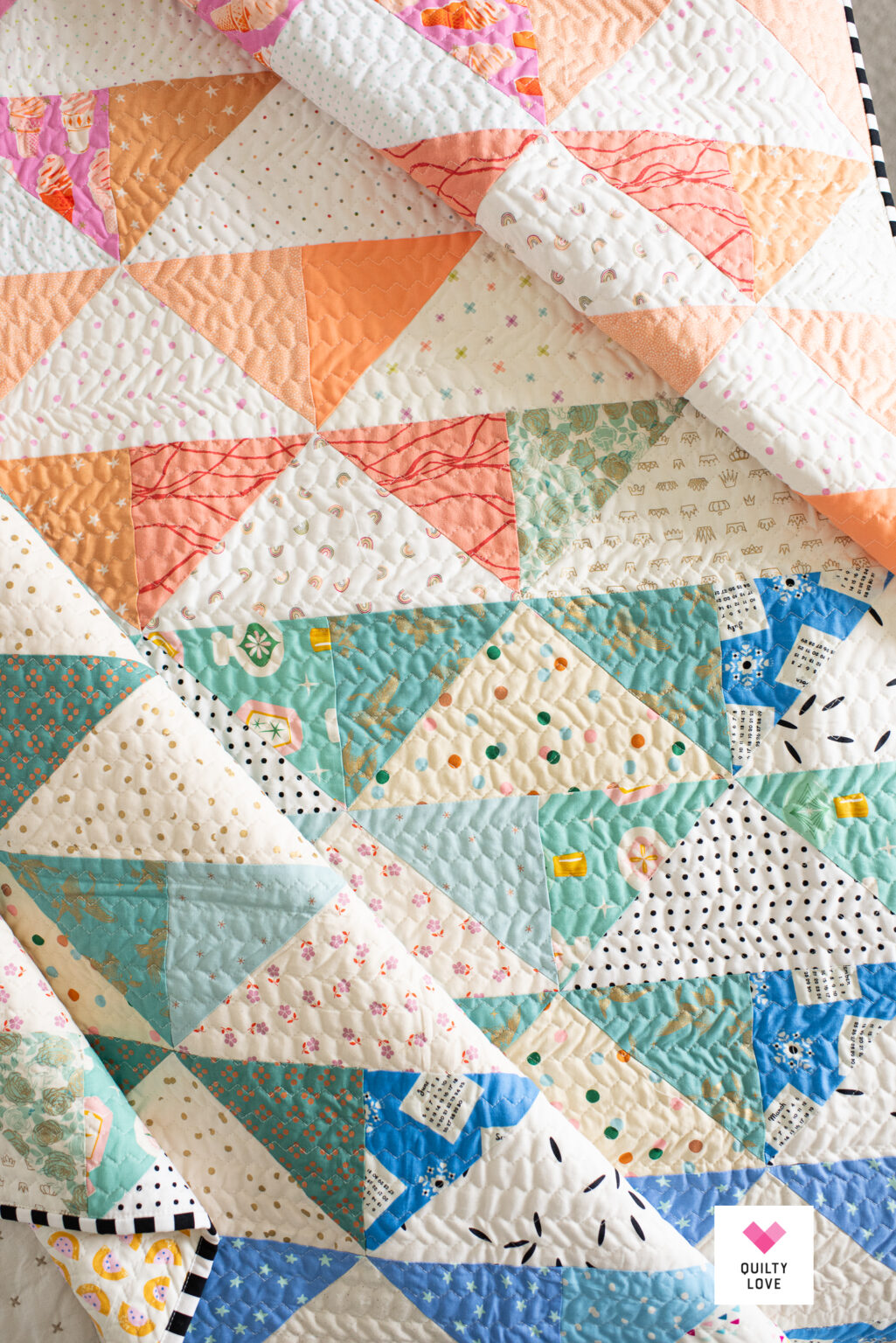 Scrappy Rainbow Patchwork Flying Geese quilt - Quilty Love